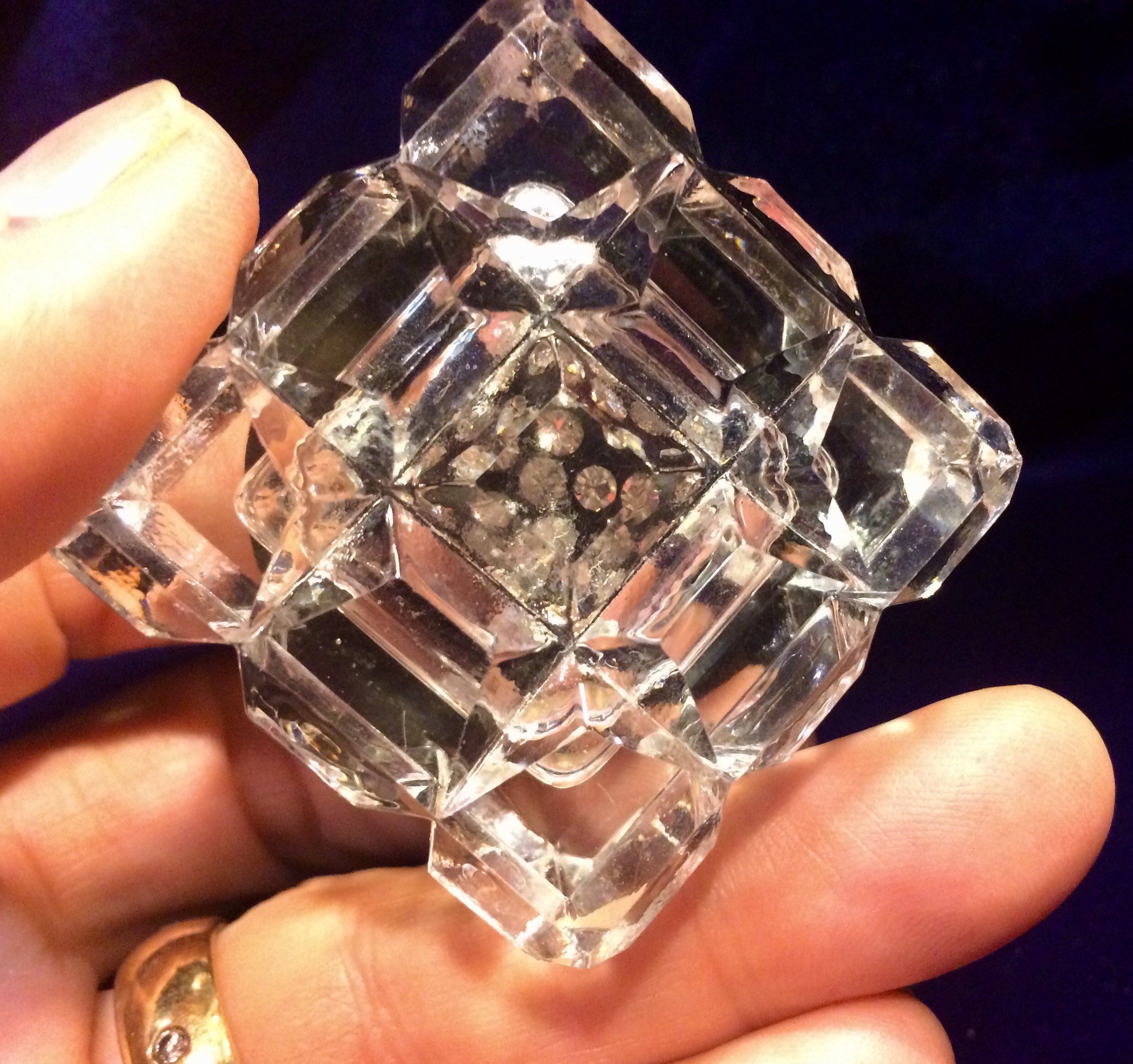 Gorgeous Faceted Gem Centers a Cluster of Ruby Rhinestones on a Cubed ...
