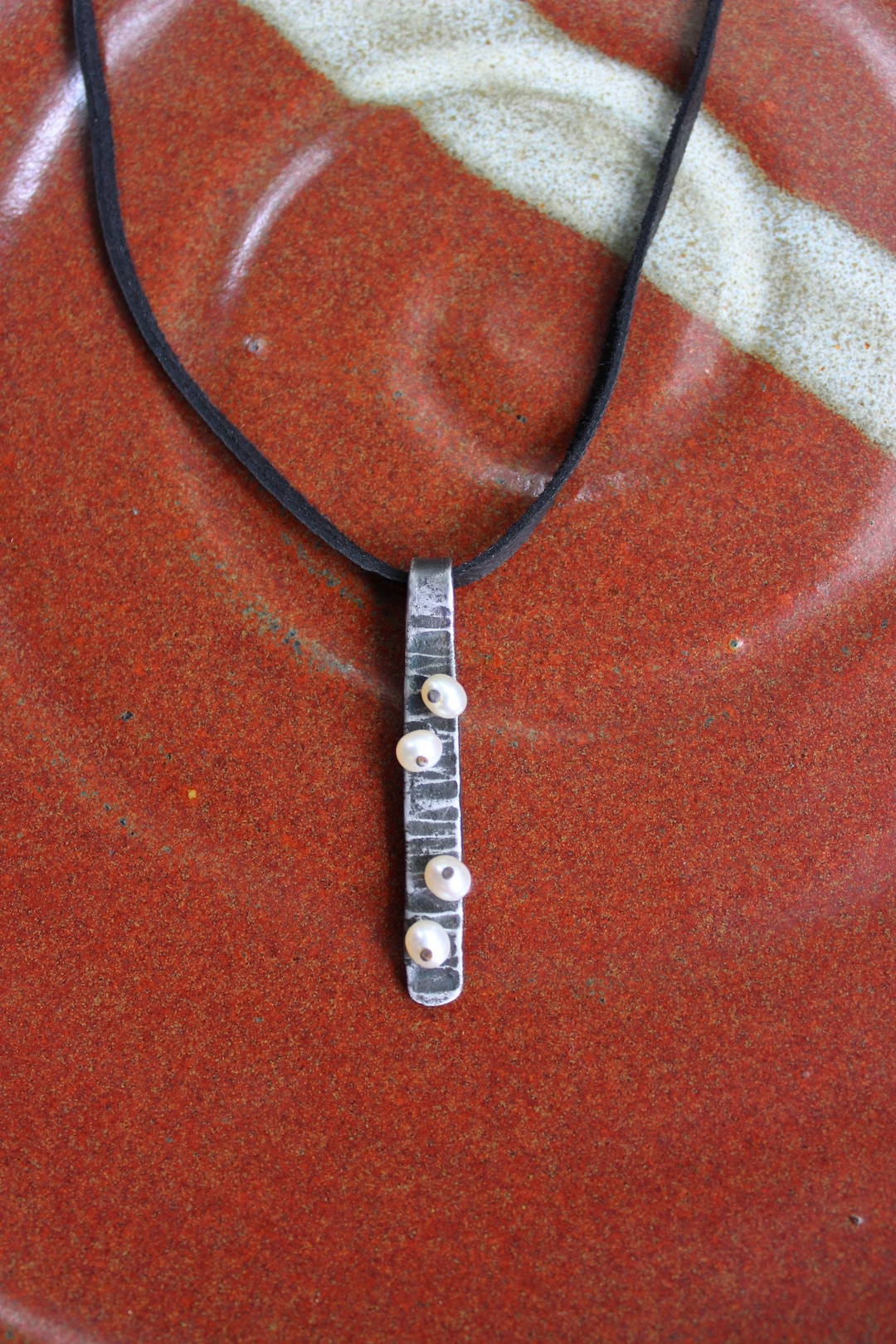 Iron and Pearl Barnacle Pendent: Forged Iron Textured Bar With 4 White ...
