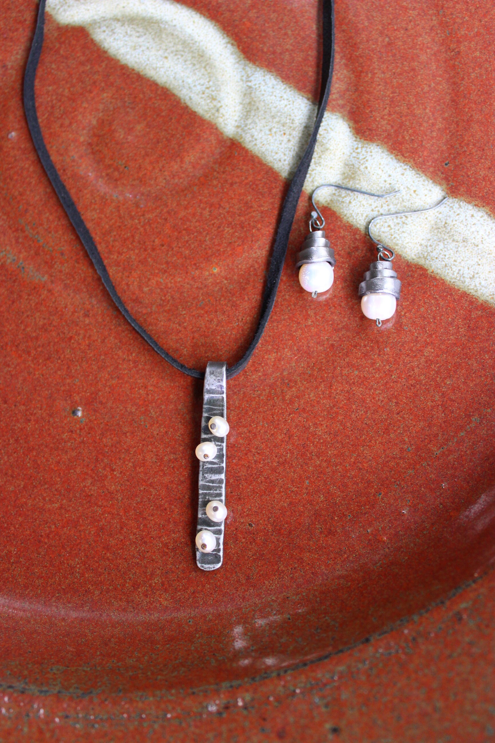 Iron and Pearl Barnacle Pendent: Forged Iron Textured Bar With 4 White ...