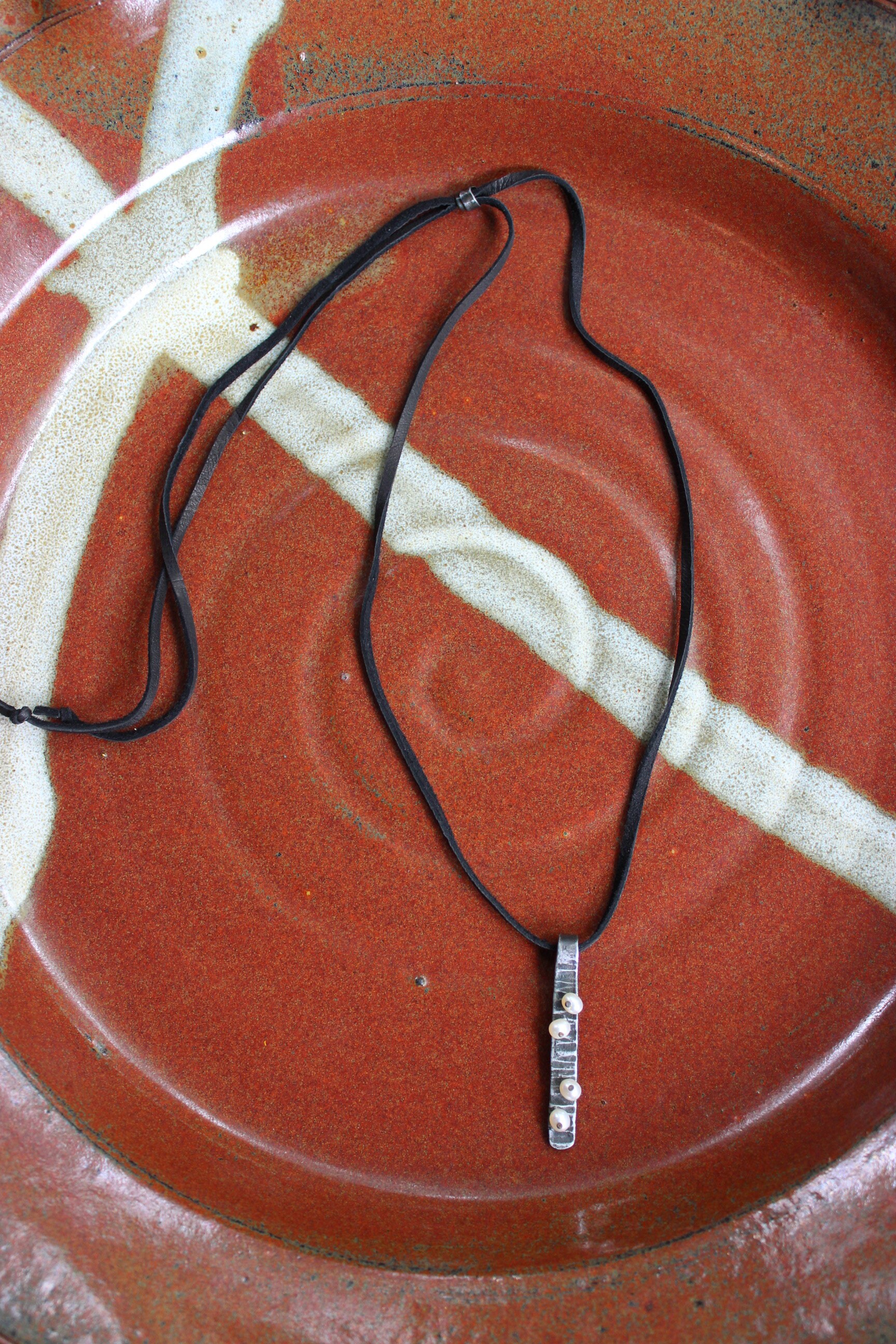 Iron and Pearl Barnacle Pendent: Forged Iron Textured Bar With 4 White ...