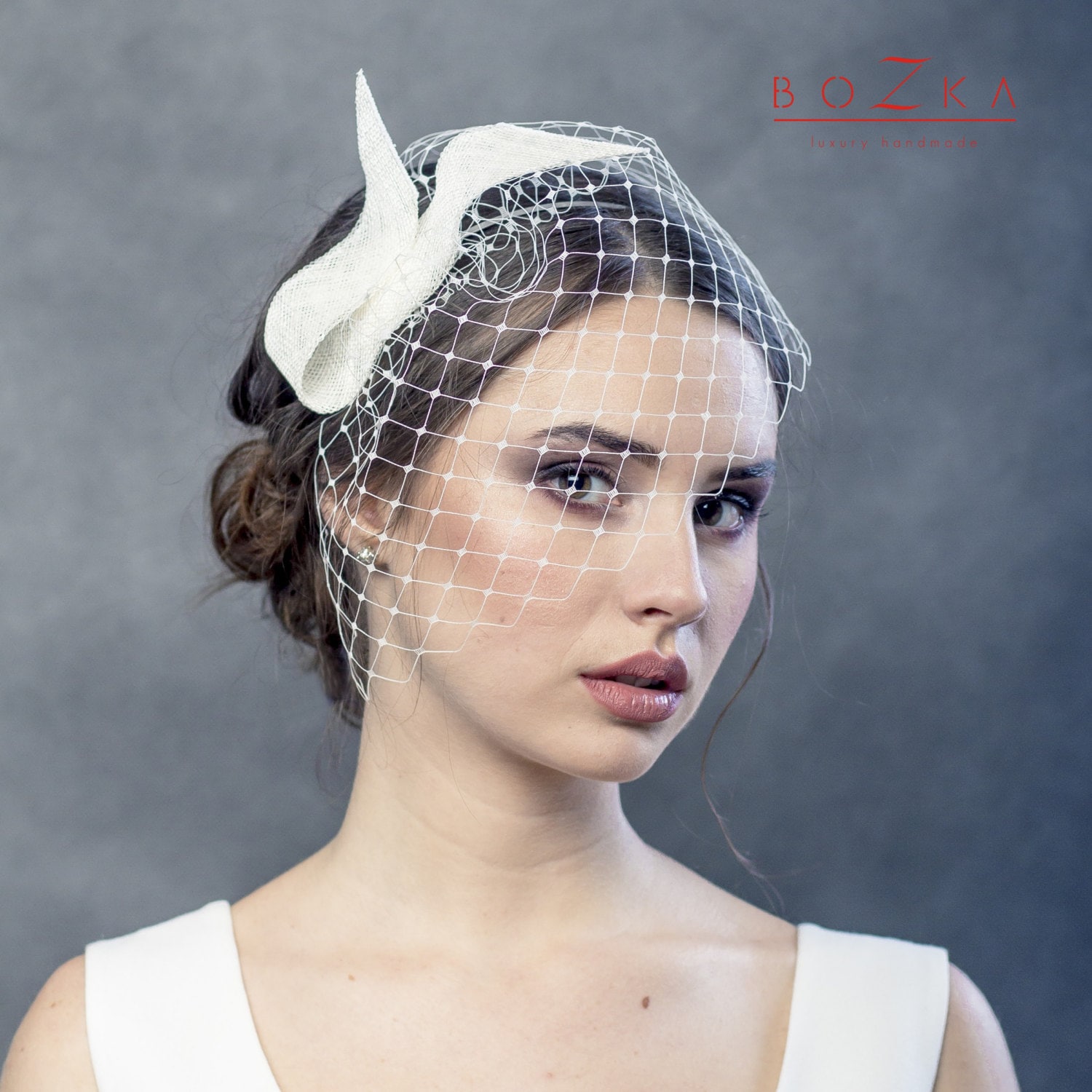 Modern Wavy Wedding Fascinator With Small Bow and Merry Widow Veiling ...
