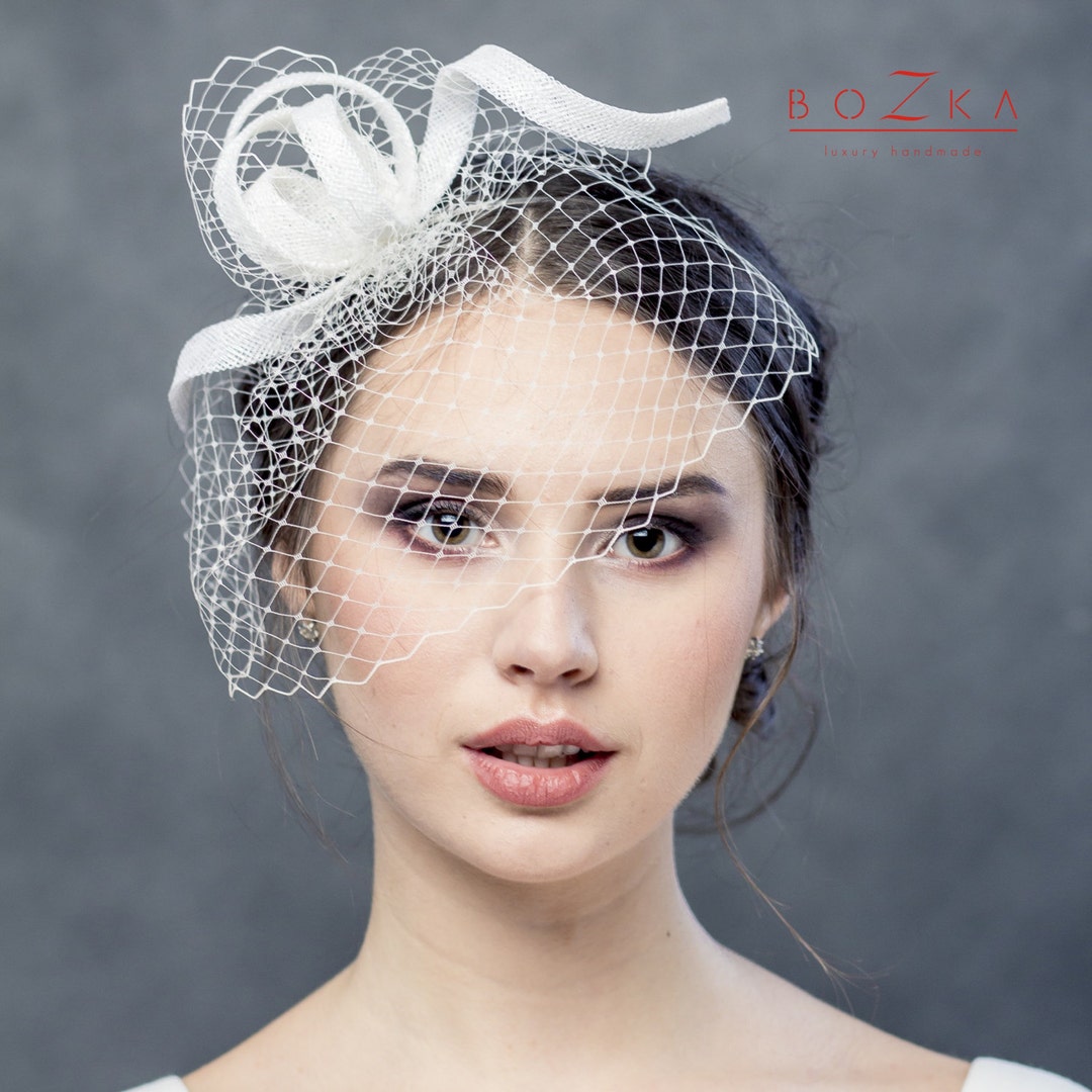 Modern Curly Wedding Fascinator With Small Bow and Delicate Veiling ...