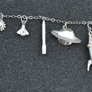 Space Charms Bracelet. Assorted Angelwear Silver Space Charms Soldered ...