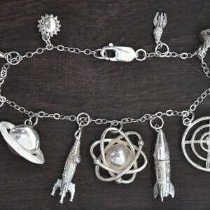 Space Charms Bracelet. Assorted Angelwear Silver Space Charms Soldered ...