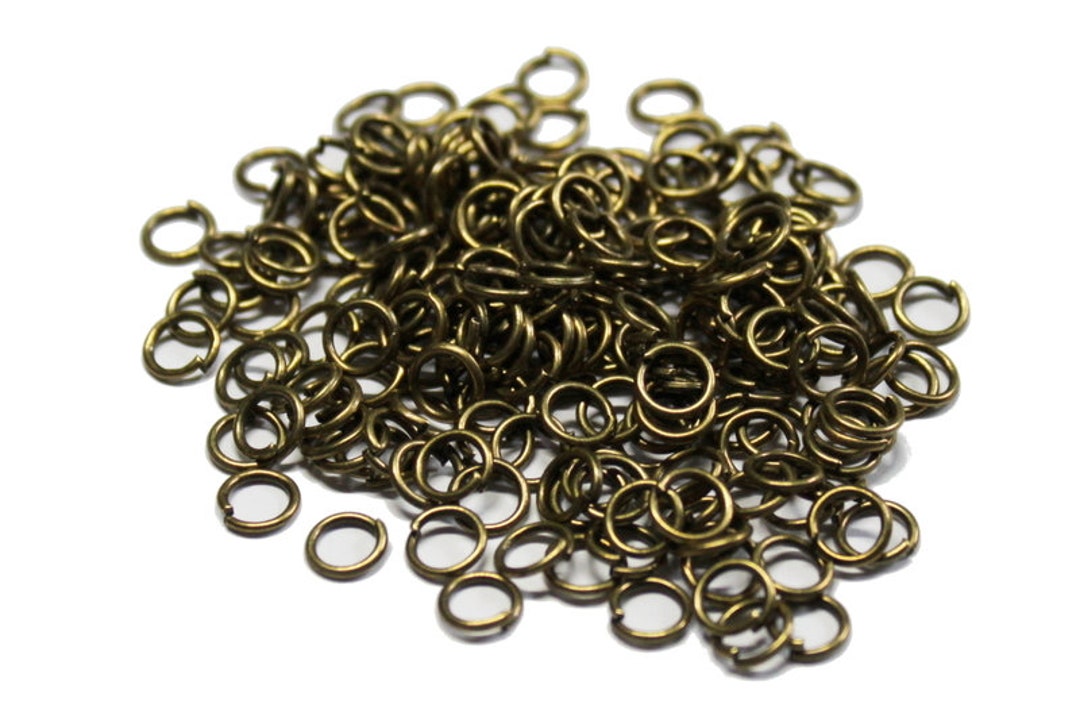 100 anillos, anillos aglutinantes, aprox. 6/09 mm, bronce - Etsy España