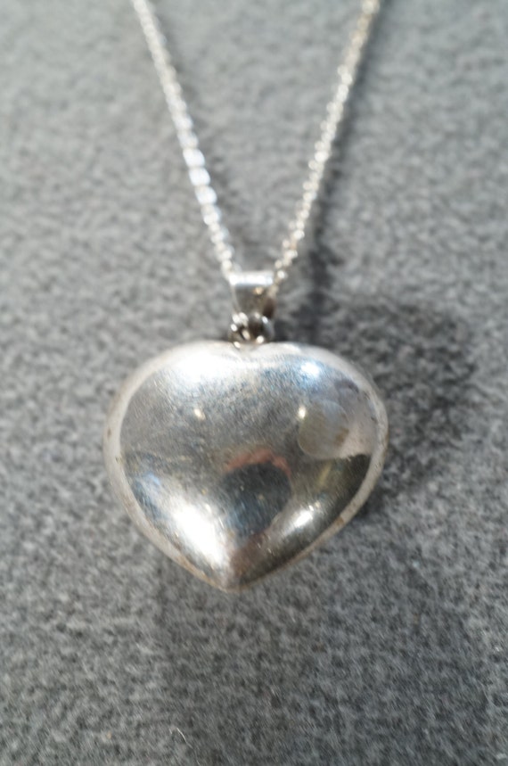 Heart shaped silver pendant store