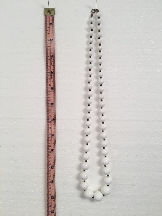 1960s 12" White Graduated Round Plastic Beads with Br… - Gem