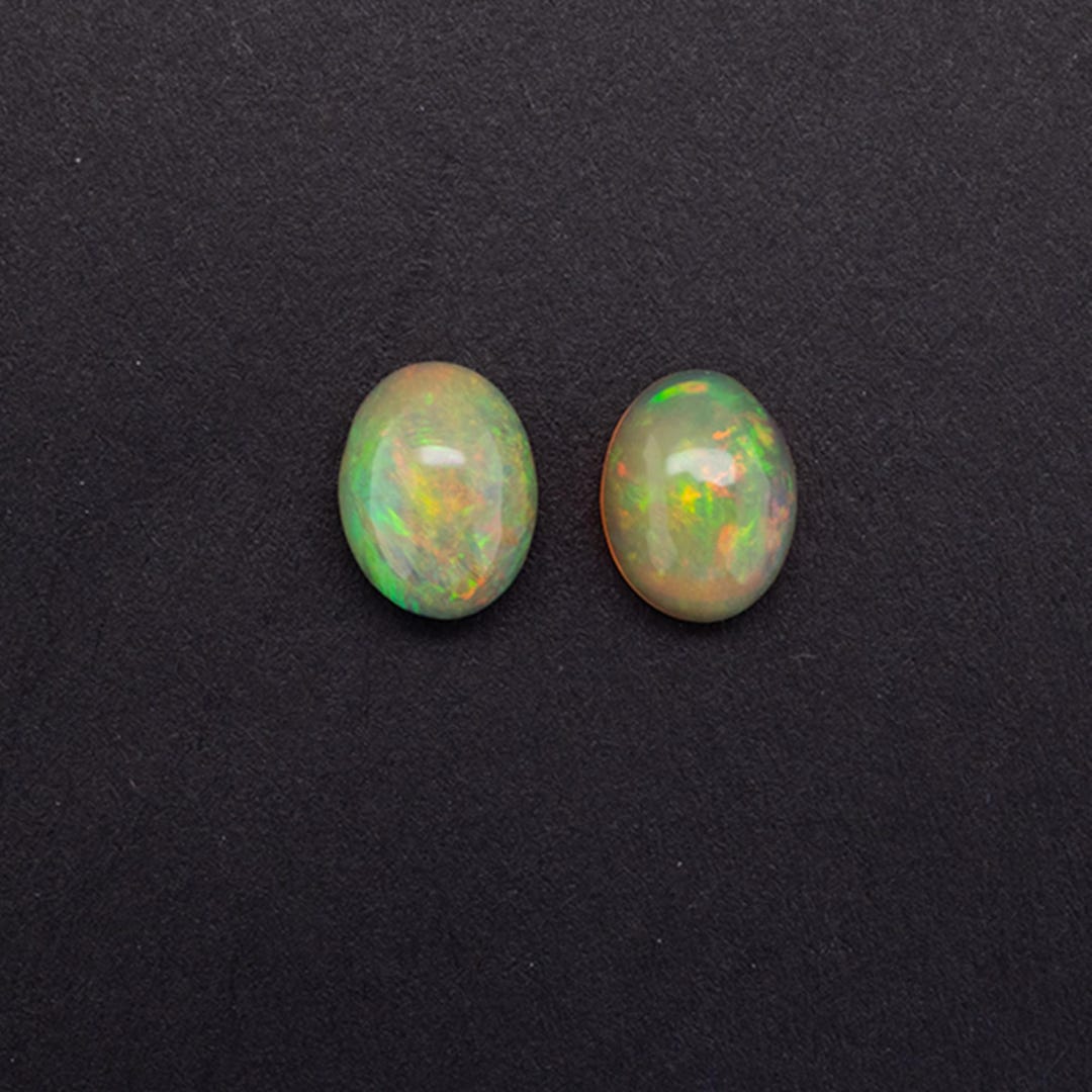 Ethiopian Opal Cab Oval 7x5mm Approximately 0.80 Carat Matching Pair ...