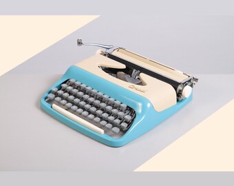 typewriter curated by UPPERCASE on Etsy