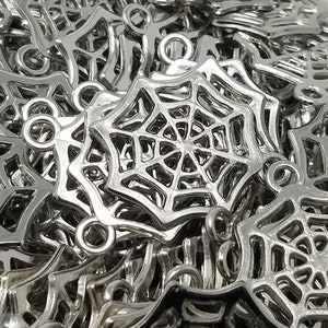 144 Pcs Plastic Filigree Spiderweb Cob Web Halloween Charms Kids' Craft ...