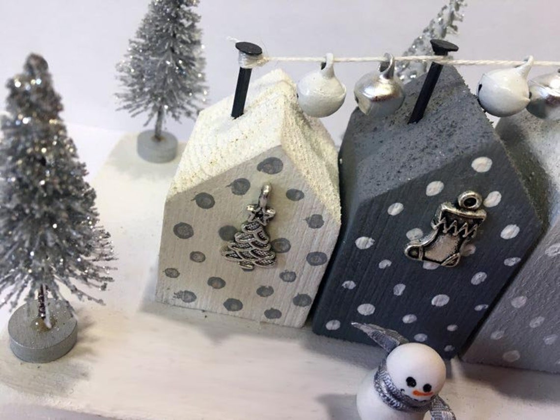 Miniature Wooden Houses on Plinth 'in the Meadow We Can Build a Snowman ...