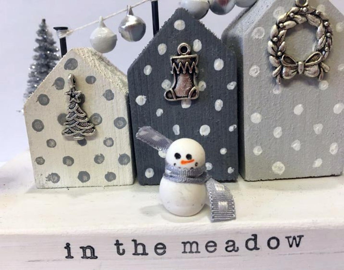 Miniature Wooden Houses on Plinth 'in the Meadow We Can Build a Snowman ...