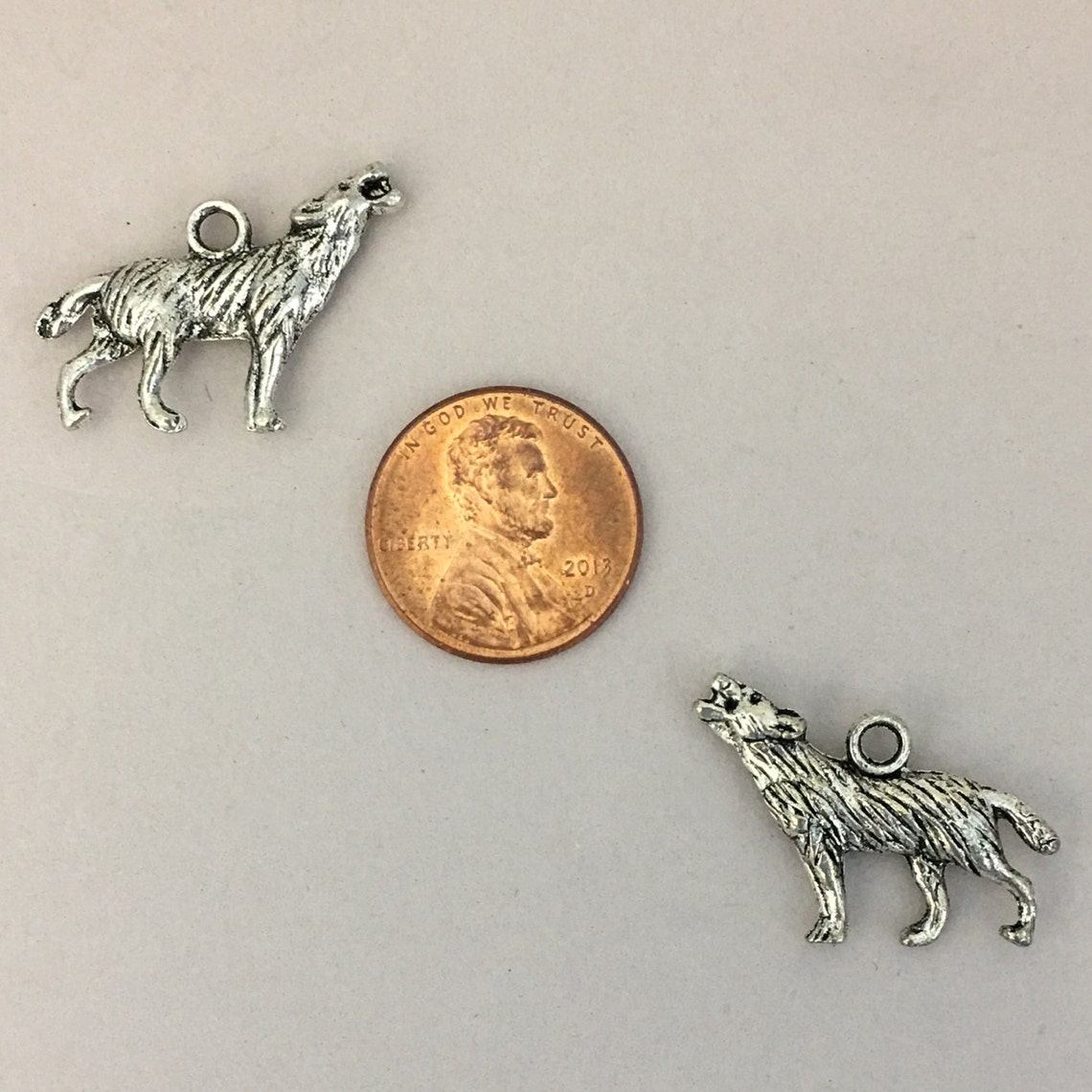 BULK 25 Howling Wolf Charm Silver by TIJC SP0152B | Etsy