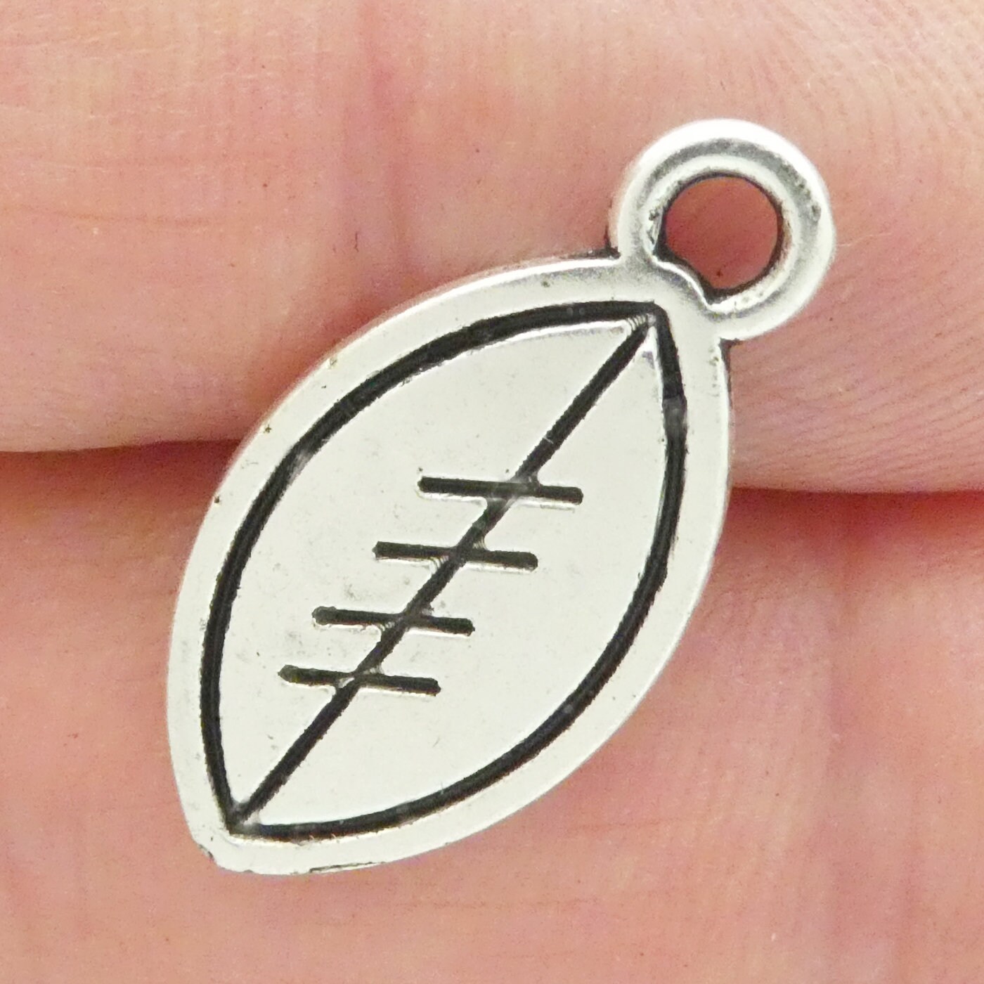 BULK 60 Football Charm Silver 24x12mm by TIJC SP0985B - Etsy