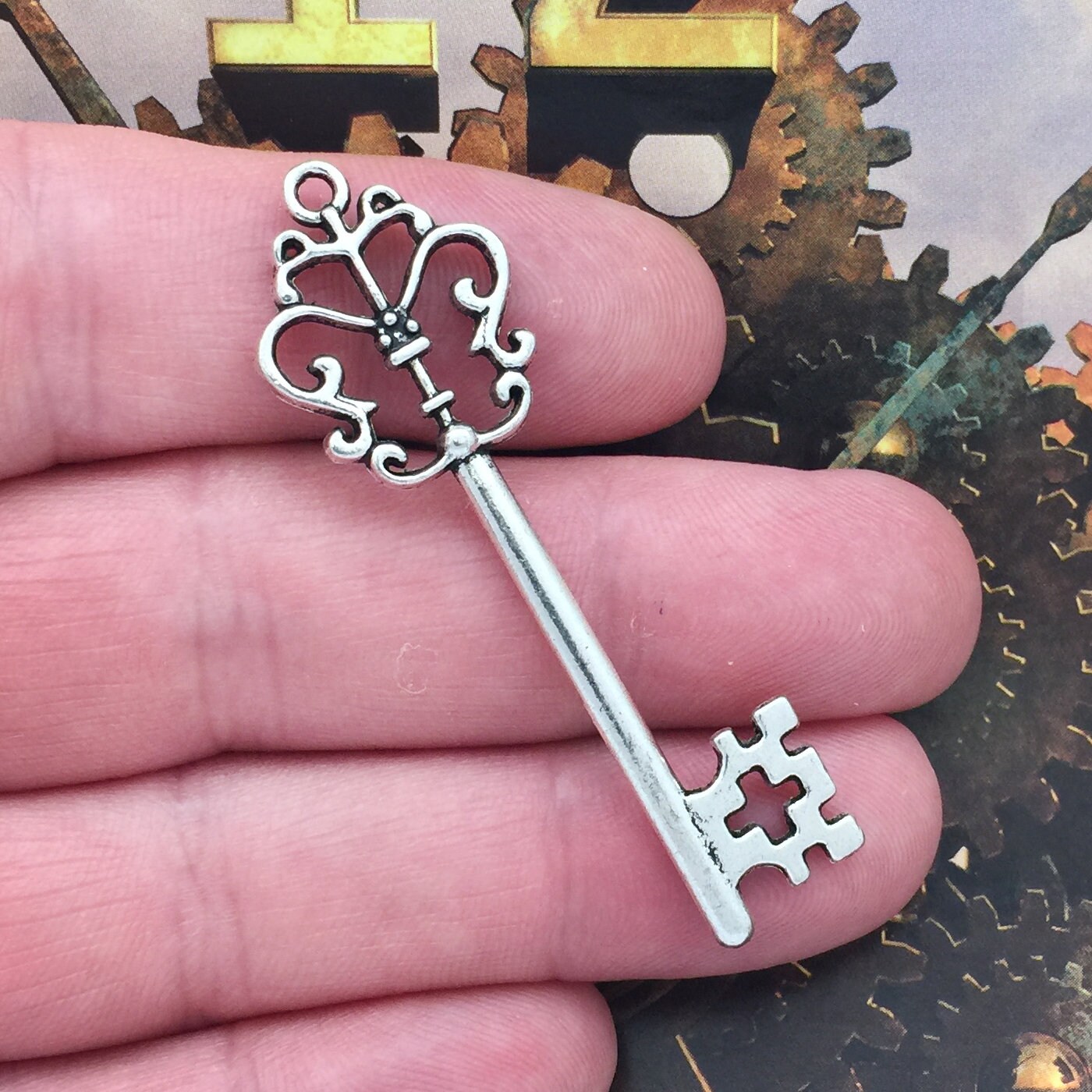 BULK 12 Silver Skeleton Key Charm by TIJC SP0110B | Etsy