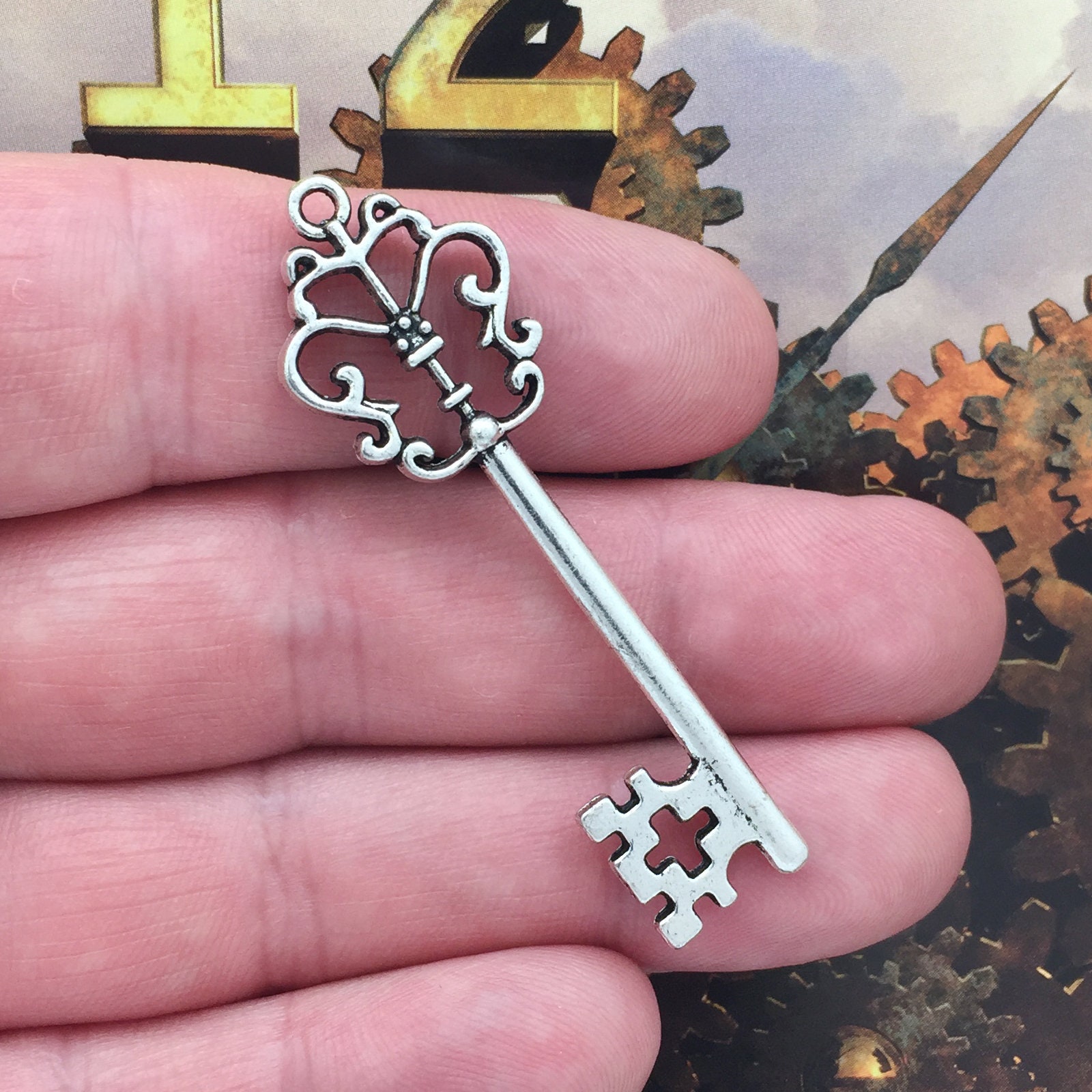 BULK 12 Silver Skeleton Key Charm by TIJC SP0110B | Etsy