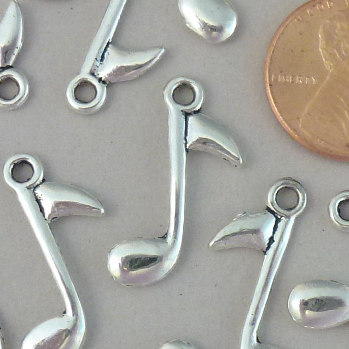 BULK 60 Silver Music Note Charm by TIJC SP0061B - Etsy