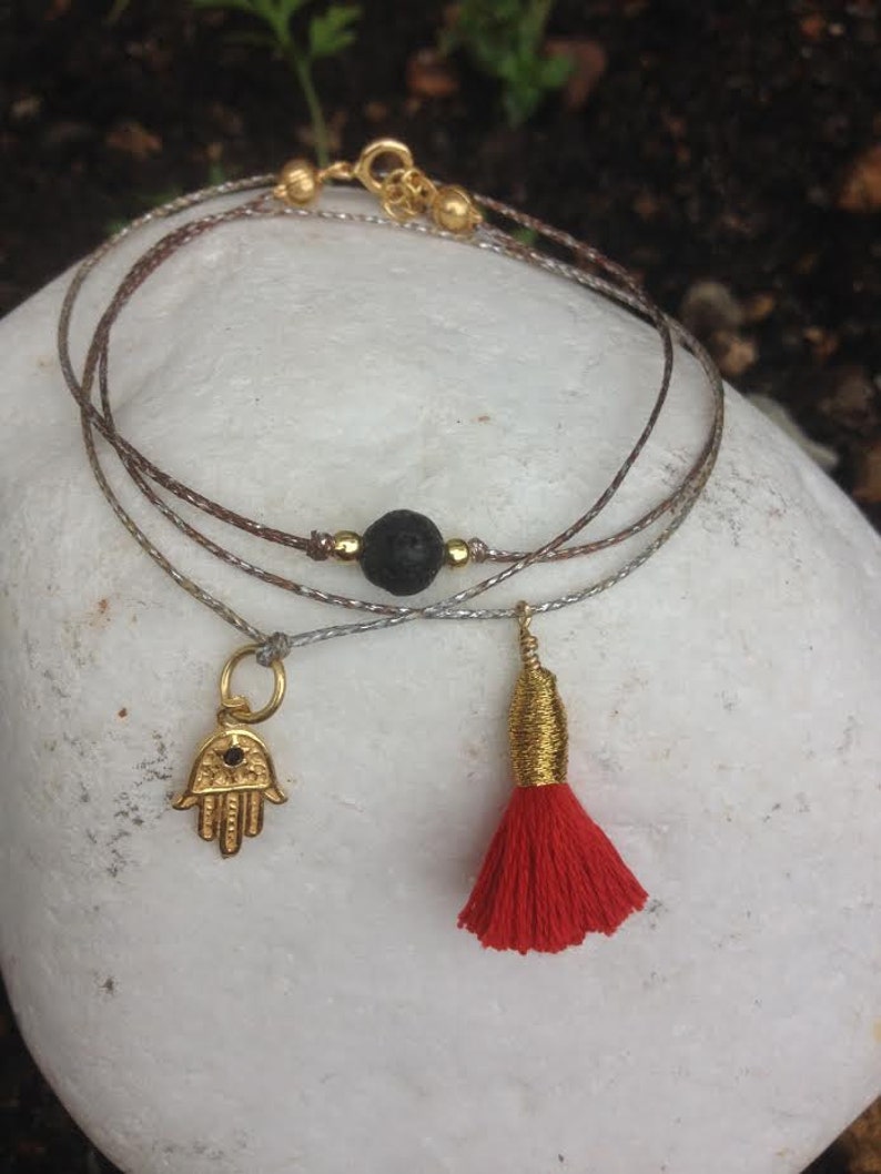 Waxed Metallic Thread Charm Bracelet With a Volcanic Rock and a ...