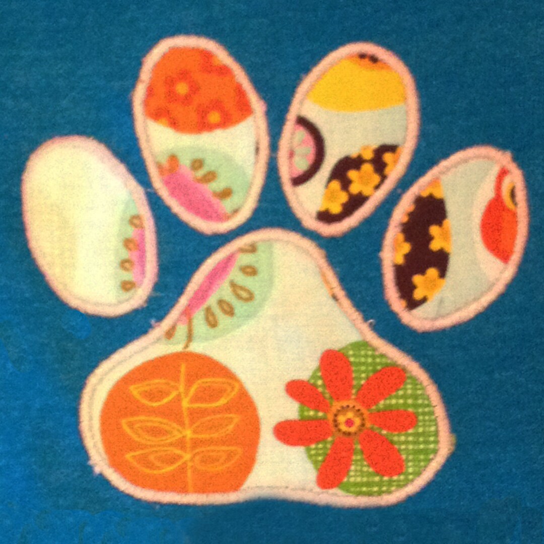 Eight Different Versions of a Paw Print Applique and Embroidery Design ...