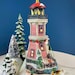 Illuminated Lighthouse. Christmas Village House. Home or Retail Holiday ...