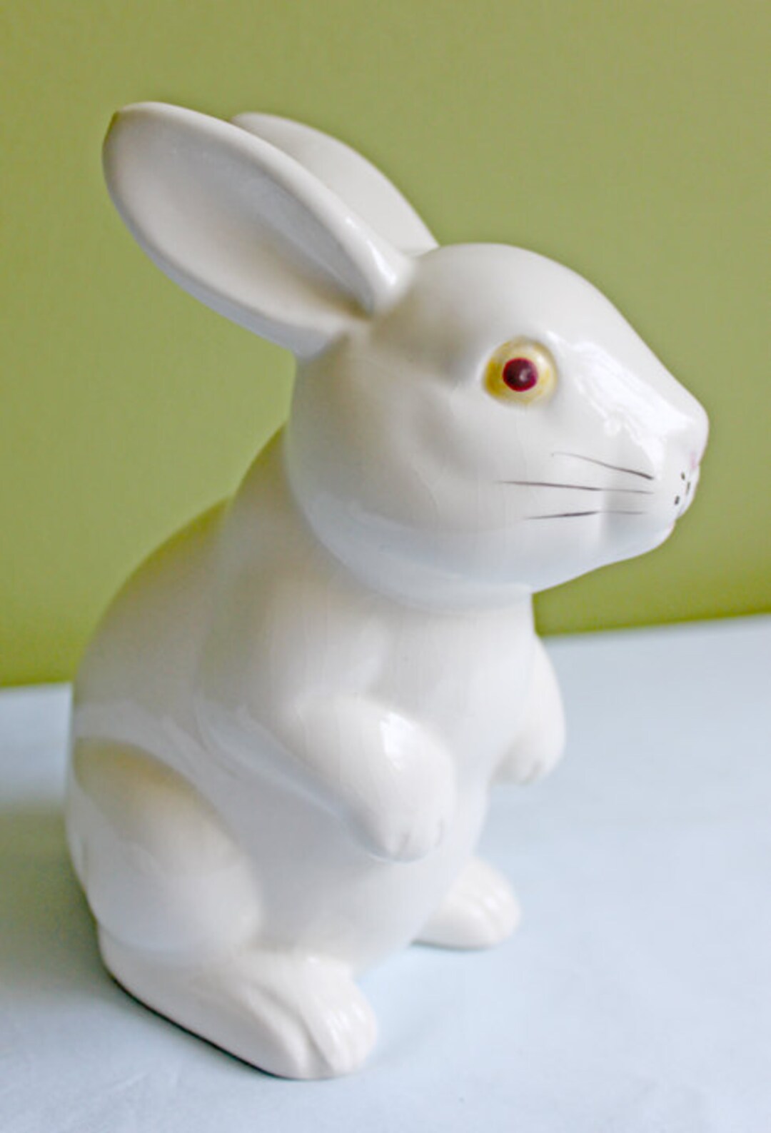 Cute Porcelain Bunny. Cream Colored Rabbit Figurine With Colored Eyes ...