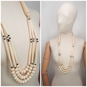 70s Wood Bead With Faux Bone Stenciled Pendant, 70s 70s Wood Bead With Faux Bone Stenciled Pendant, 70s