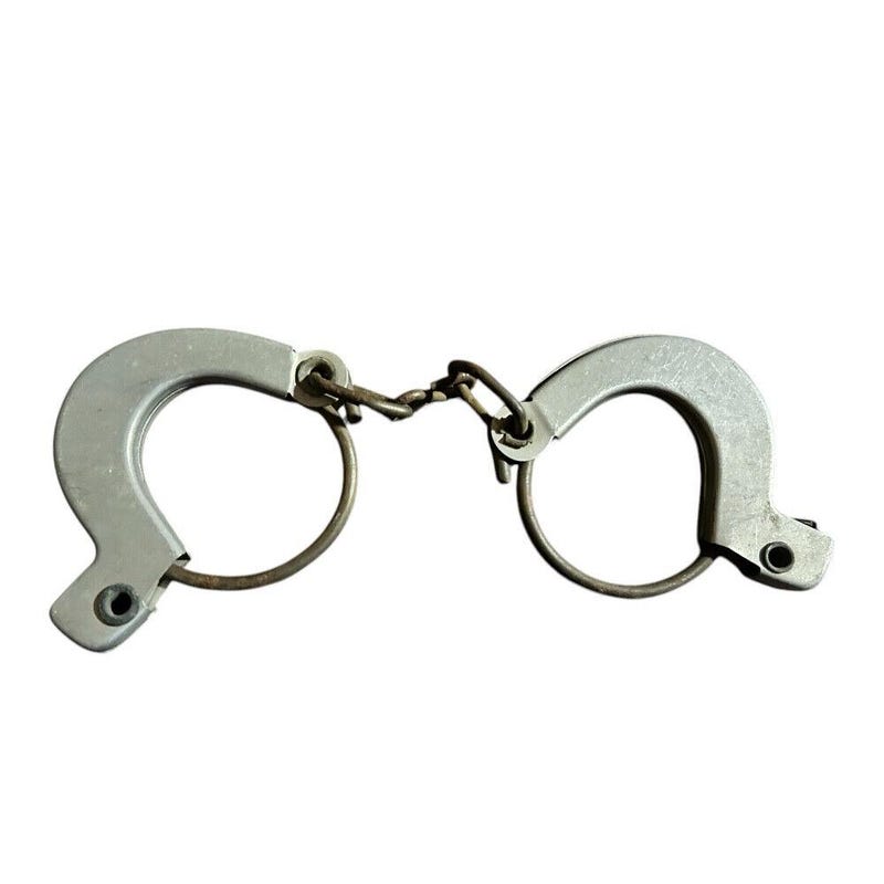 Child in Handcuffs - Etsy