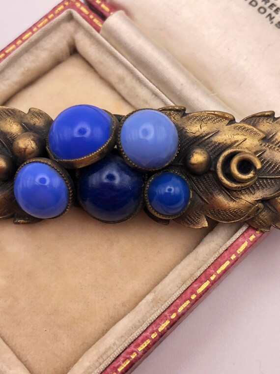 1920s Neiger Brothers Brooch with Blue Cabochon stone… - Gem