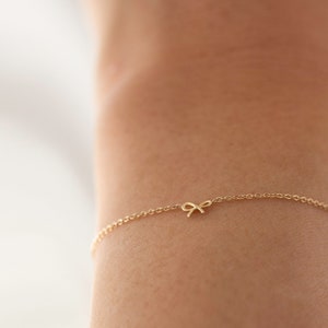 14k Mini Bow Bracelet | Dainty Ribbon Bow Bracelet in 14k Gold | Petite ...