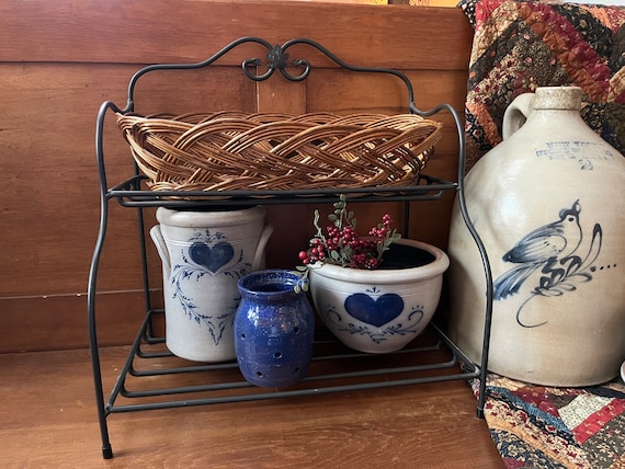 Bakers rack with wicker baskets store