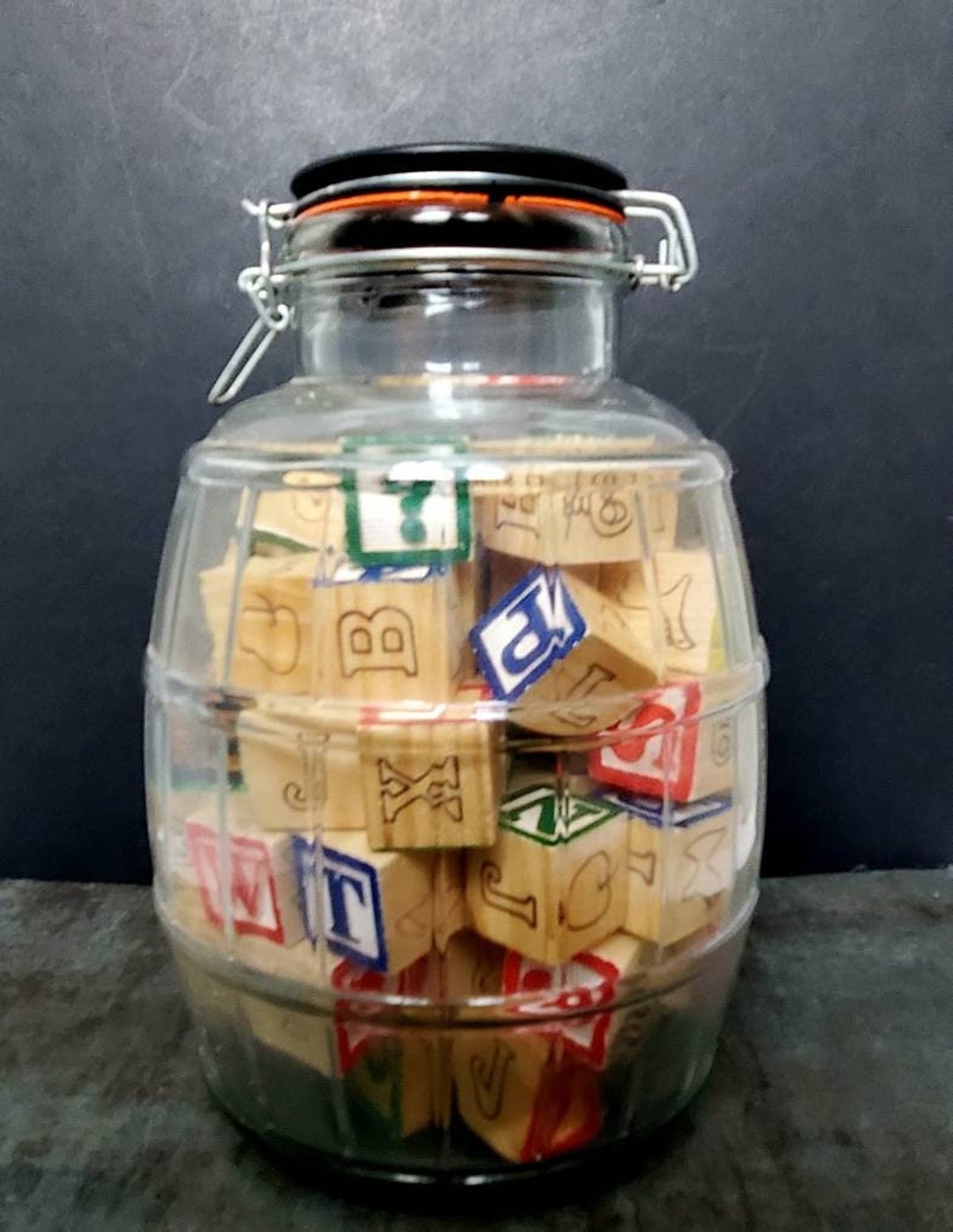 Large Vintage Barrel Jar With Black Cap Lock Lid Filled With Colorful ...