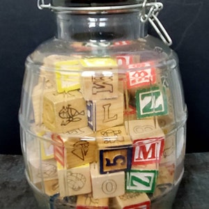 Large Vintage Barrel Jar With Black Cap Lock Lid Filled With Colorful ...