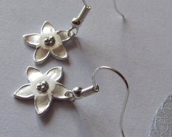 Cute little silver flower post earrings | Etsy
