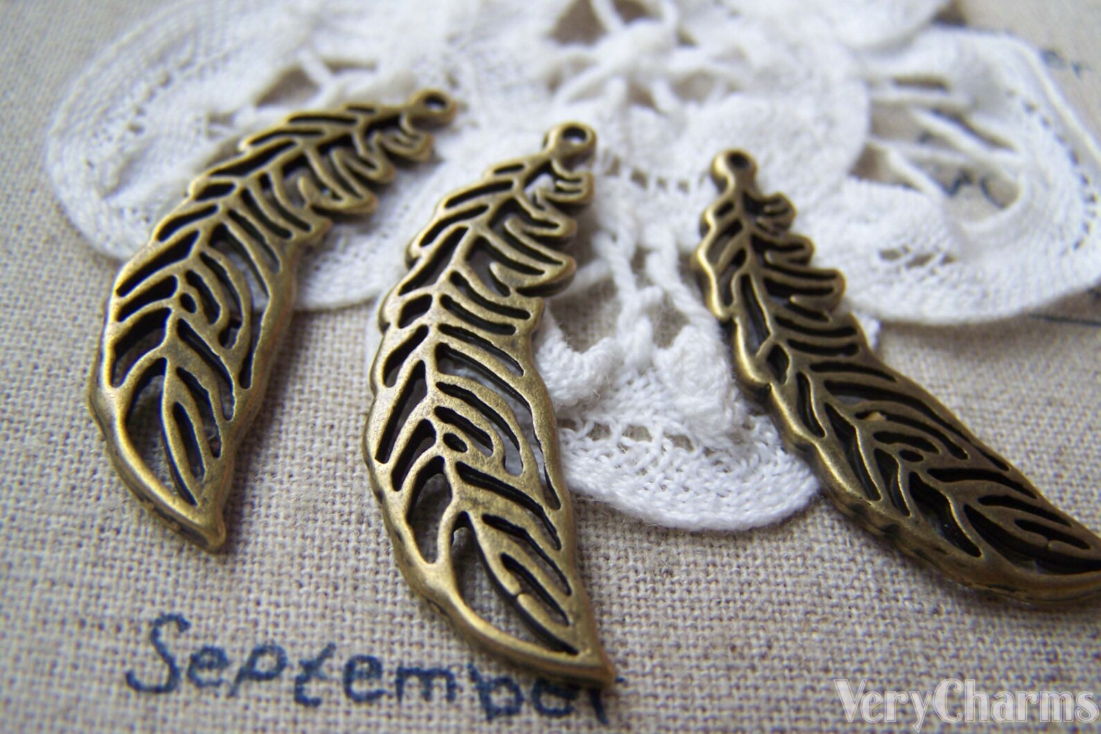 10 Pcs of Antique Bronze Filigree Feather Charms Pendants - Etsy