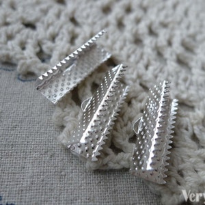 50 Pcs of Silver Tone Iron Ribbon Ends Clamps Fasteners Clasps 20mm ...