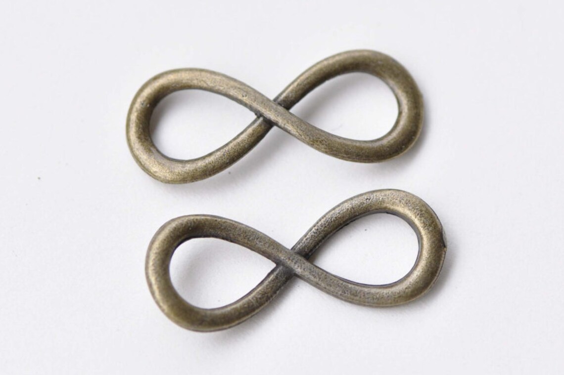 20 Pcs Antique Bronze Figure 8 Connector Charms 13x31mm A8644 - Etsy