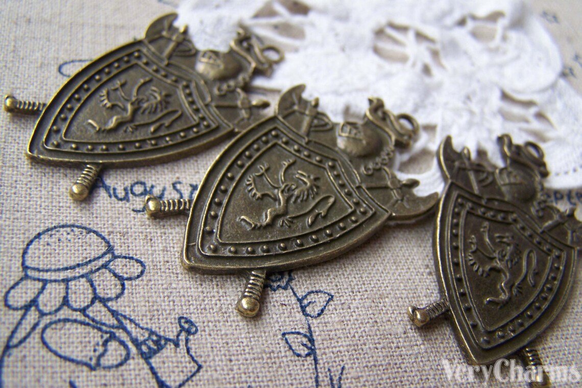 4 Pcs of Antique Bronze Shield Badge Charms Pendants 28x43mm A263 - Etsy