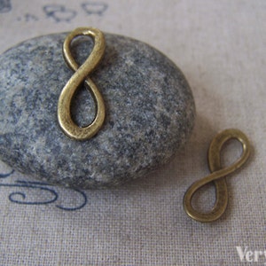 10 Pcs Antique Bronze Figure 8 Connector Charms 8x23mm A4538 - Etsy