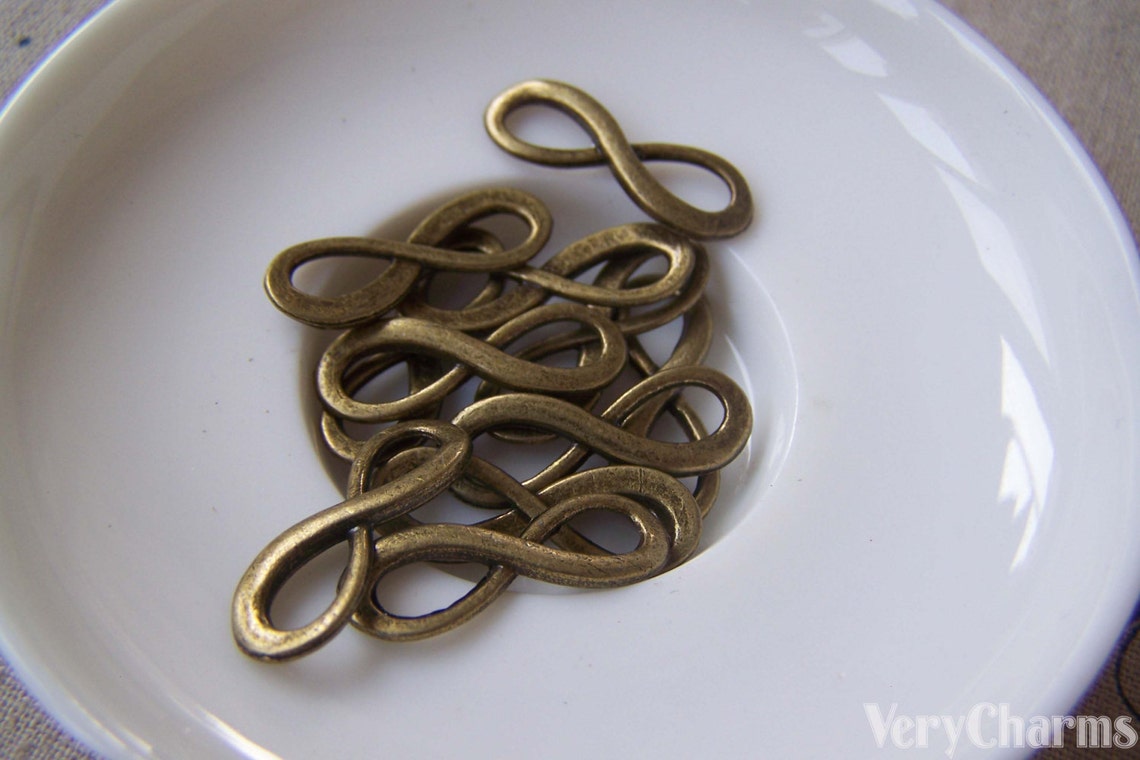 10 Pcs Antique Bronze Figure 8 Connector Charms 8x23mm A4538 - Etsy