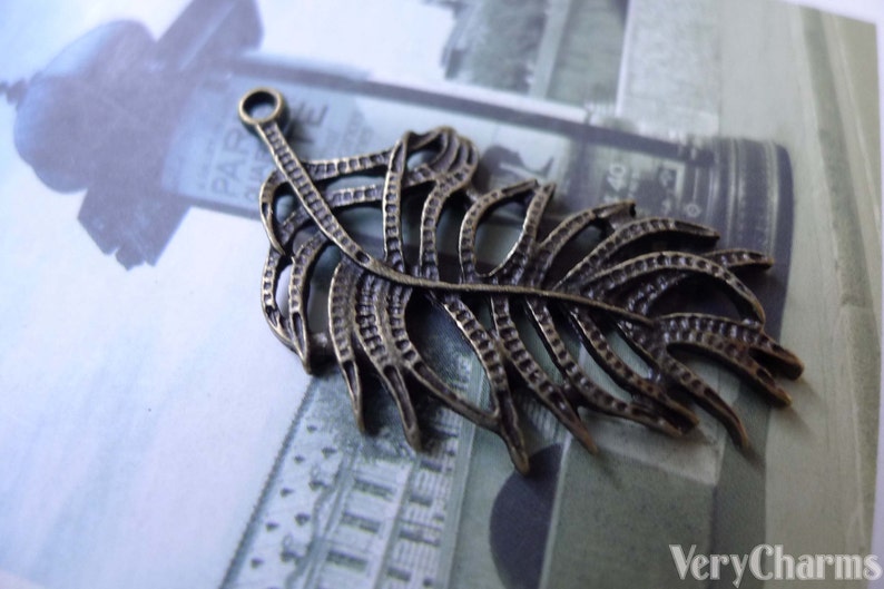 10 Pcs of Antique Bronze Filigree Feather Charms 19x37mm A7737 - Etsy