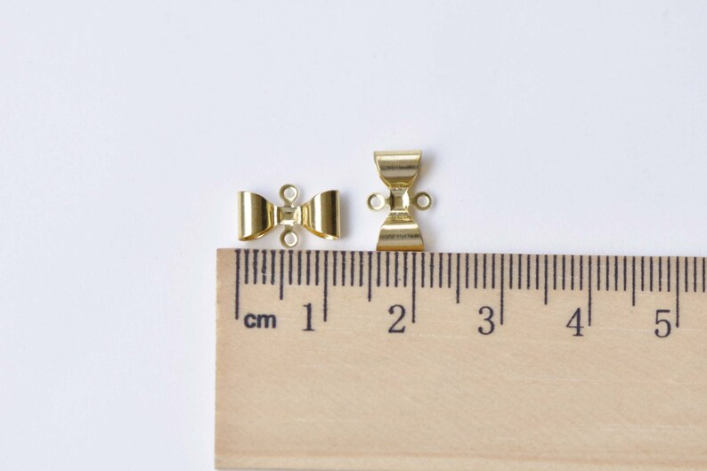 20 Pcs of Raw Brass Bow Tie Knot Connectors 7x12mm A8569 - Etsy