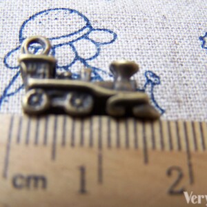 10 Pcs of Antique Bronze Train Head Charms 17mm A935 - Etsy