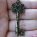10 Pcs of Antique Bronze Skeleton Key Swirly Key Pendants Charms ...