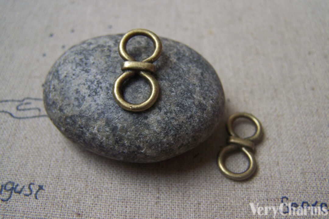 20 Pcs of Antique Bronze Figure 8 Connector Charms 9x19mm A4760 - Etsy