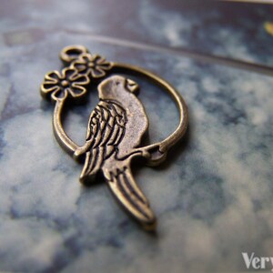 20 Pcs of Antique Bronze Parrot Ring Charms 15x28mm A296 - Etsy