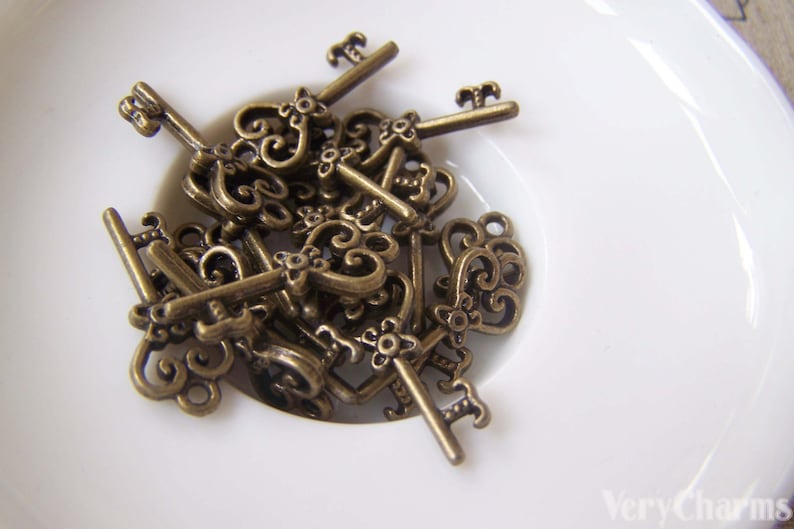 20 Pcs of Antique Bronze Skeleton Key Heart Key Charms 9x21mm - Etsy