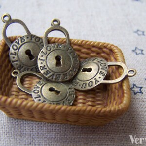 10 Pcs of Antique Bronze Round Lock Charms 13x21mm A2787 - Etsy