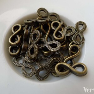 50 Pcs of Antique Bronze Figure 8 Connector Charms 5.5x12.5mm A6220 - Etsy