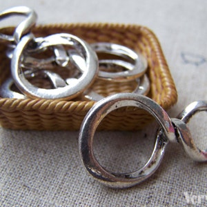 10 Pcs of Antique Silver Twisted Figure 8 Connectors Charms 16x31mm ...