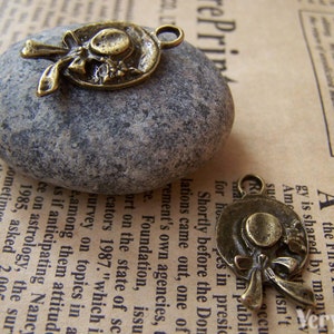 10 Pcs of Antique Bronze Bow Tie Flower Summer Hat Charms 15x26mm A1409 ...